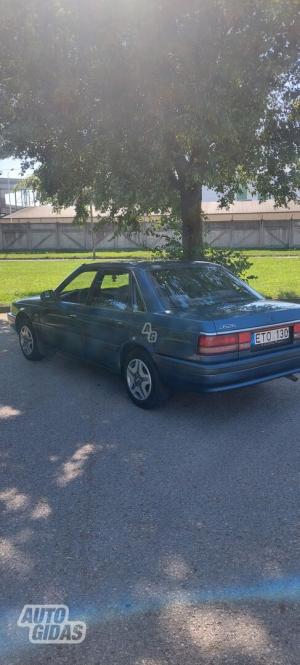 Blue Mazda 626 1988 in Klaipeda, with an engine capacity of 2.00 L and mileage of 224 thousand km for 1000 €, photo 8 on AUTOMOTO.COM.LV