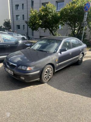 Blue Mazda 626 1997 in Vilnius, with an engine capacity of 1.84 L and mileage of 170 thousand km for 599 €, photo  on AUTOMOTO.COM.LV
