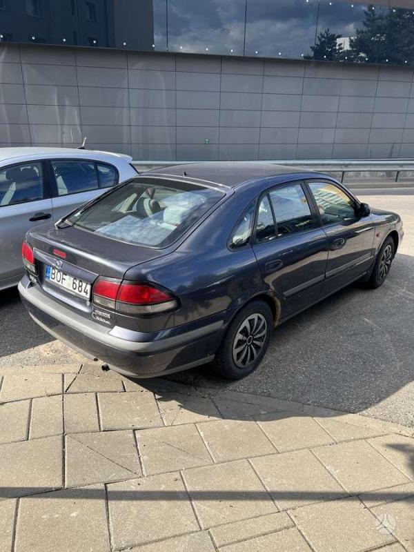 Blue Mazda 626 1997 in Vilnius, with an engine capacity of 1.84 L and mileage of 170 thousand km for 599 €, photo 3 on AUTOMOTO.COM.LV
