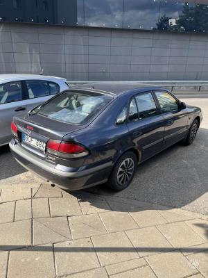 Blue Mazda 626 1997 in Vilnius, with an engine capacity of 1.84 L and mileage of 170 thousand km for 599 €, photo 4 on AUTOMOTO.COM.LV