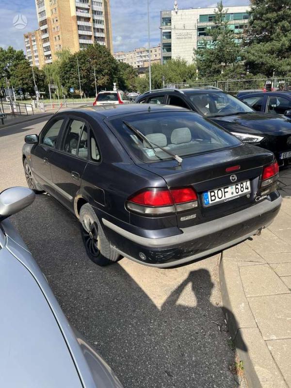 Blue Mazda 626 1997 in Vilnius, with an engine capacity of 1.84 L and mileage of 170 thousand km for 599 €, photo 4 on AUTOMOTO.COM.LV
