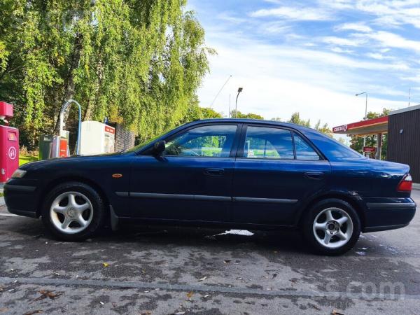Zils Mazda 626 1998 Rīga, ar dzinēja tilpumu 1.80 L un nobraukumu 217 tūkst. km par 600 €, foto 5 vietnē AUTOMOTO.COM.LV