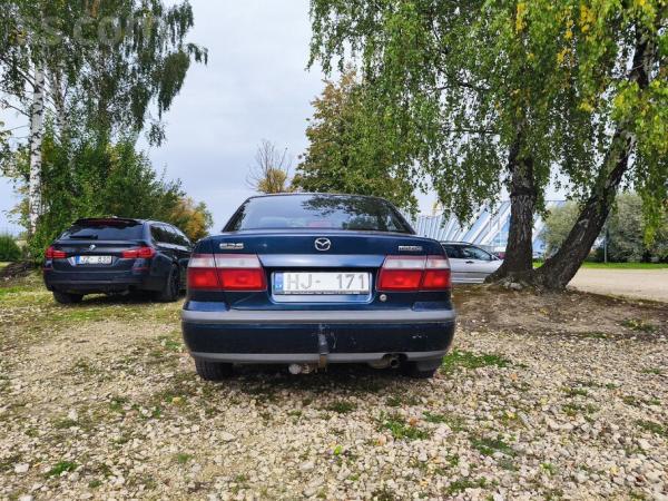 Zils Mazda 626 1998 Rīga, ar dzinēja tilpumu 1.80 L un nobraukumu 217 tūkst. km par 600 €, foto 10 vietnē AUTOMOTO.COM.LV