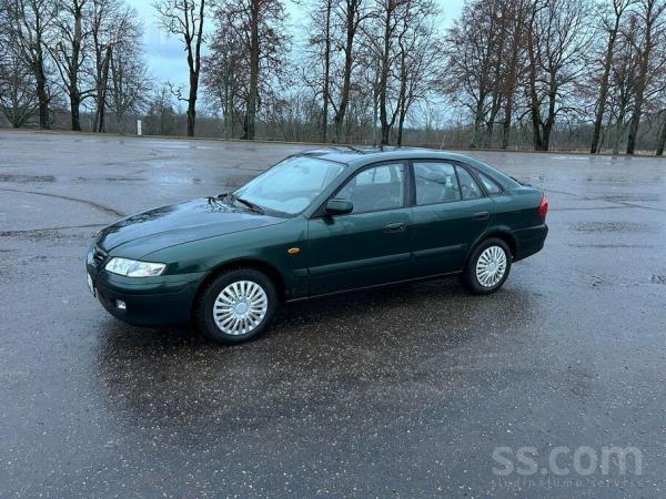 Green Mazda 626 1999 in Ventspils, with an engine capacity of 1.80 L and mileage of 230 thousand km for 1000 €, photo 1 on AUTOMOTO.COM.LV