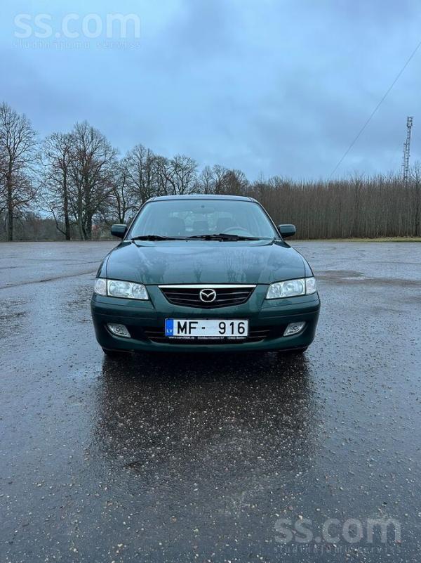 Green Mazda 626 1999 in Ventspils, with an engine capacity of 1.80 L and mileage of 230 thousand km for 1000 €, photo 3 on AUTOMOTO.COM.LV
