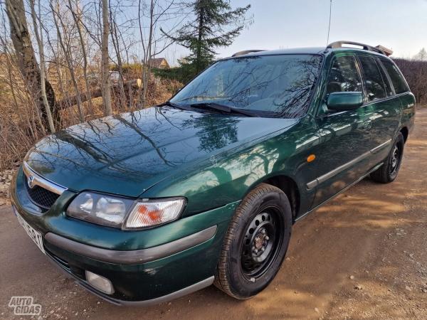 Green Mazda 626 1999 in Ukmerge, with an engine capacity of 1.80 L and mileage of 200 thousand km for 650 €, photo 1 on AUTOMOTO.COM.LV