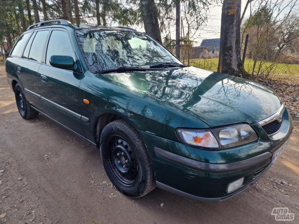 Green Mazda 626 1999 in Ukmerge, with an engine capacity of 1.80 L and mileage of 200 thousand km for 650 €, photo 2 on AUTOMOTO.COM.LV