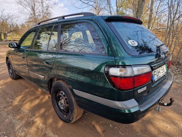 Green Mazda 626 1999 in Ukmerge, with an engine capacity of 1.80 L and mileage of 200 thousand km for 650 €, photo 4 on AUTOMOTO.COM.LV