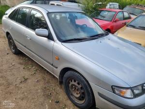 Pelēks Mazda 626 1998 Klaipėda, ar dzinēja tilpumu 1.80 L un nobraukumu 0 tūkst. km par 950 €, foto  vietnē AUTOMOTO.COM.LV