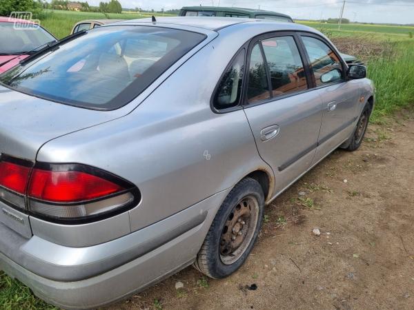 Grey Mazda 626 1998 in Klaipeda, with an engine capacity of 1.80 L and mileage of 0 thousand km for 950 €, photo 3 on AUTOMOTO.COM.LV