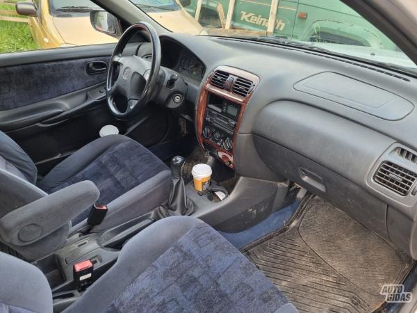 Grey Mazda 626 1998 in Klaipeda, with an engine capacity of 1.80 L and mileage of 0 thousand km for 950 €, photo 4 on AUTOMOTO.COM.LV