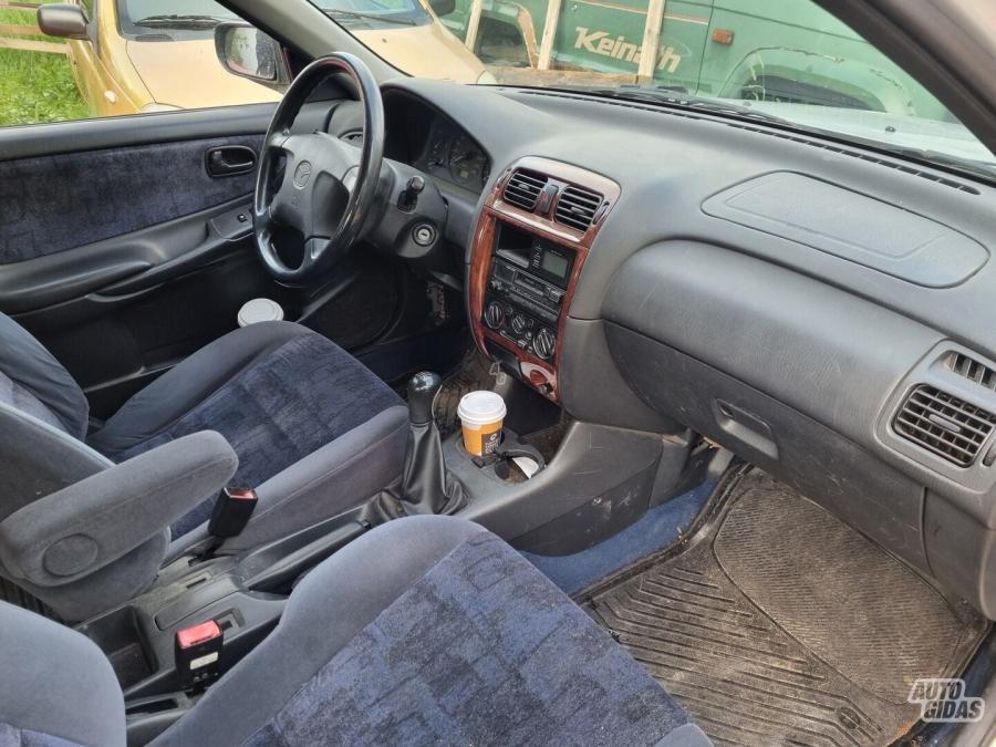 Pelēks Mazda 626 1998 Klaipėda, ar dzinēja tilpumu 1.80 L un nobraukumu 0 tūkst. km par 950 €, foto 4 vietnē AUTOMOTO.COM.LV