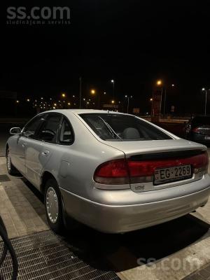 Pelēks Mazda 626 1993 Rīga, ar dzinēja tilpumu 2.00 L un nobraukumu 202 tūkst. km par 800 €, foto  vietnē AUTOMOTO.COM.LV