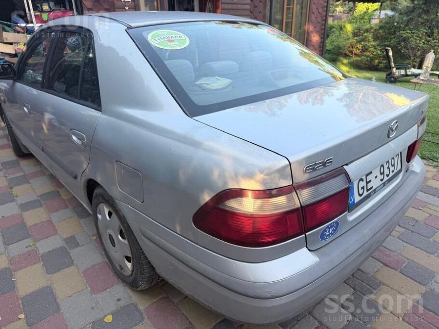 Grey Mazda 626 1998 in Riga, with an engine capacity of 2.00 L and mileage of 228 thousand km for 1199 €, photo 3 on AUTOMOTO.COM.LV