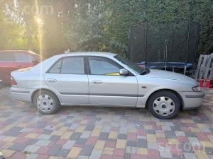 Grey Mazda 626 1998 in Riga, with an engine capacity of 2.00 L and mileage of 228 thousand km for 1199 €, photo 4 on AUTOMOTO.COM.LV