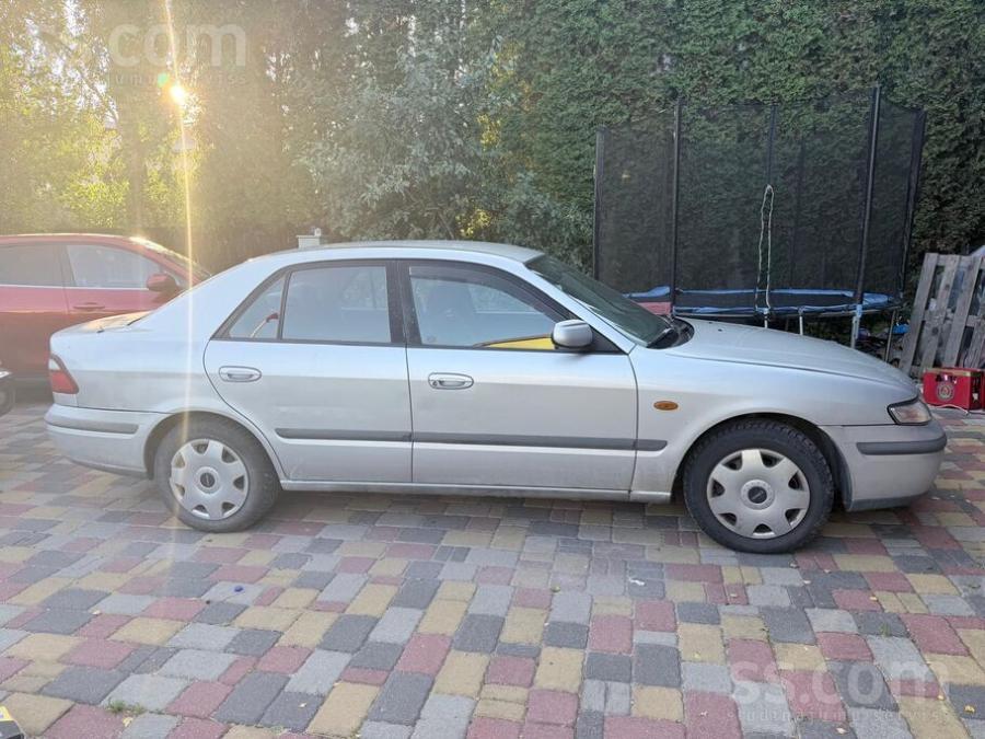 Grey Mazda 626 1998 in Riga, with an engine capacity of 2.00 L and mileage of 228 thousand km for 1199 €, photo 4 on AUTOMOTO.COM.LV