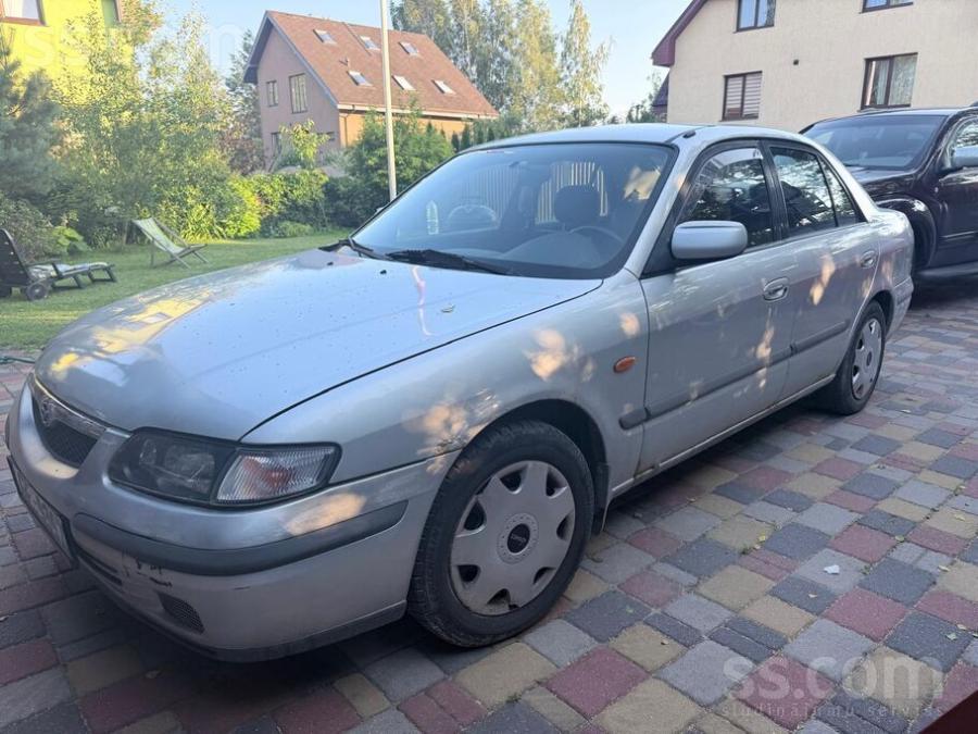 Grey Mazda 626 1998 in Riga, with an engine capacity of 2.00 L and mileage of 228 thousand km for 1199 €, photo 5 on AUTOMOTO.COM.LV