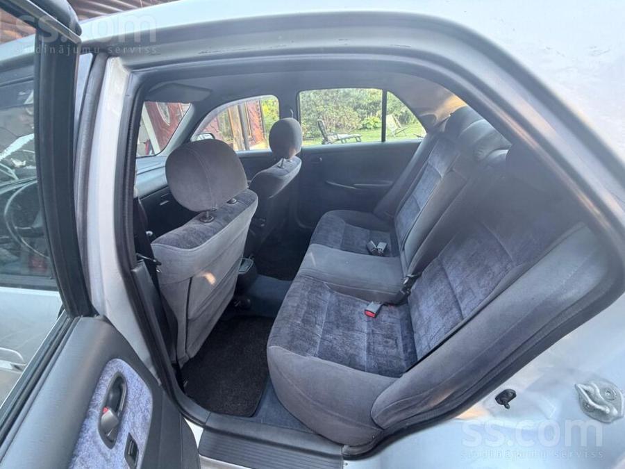 Grey Mazda 626 1998 in Riga, with an engine capacity of 2.00 L and mileage of 228 thousand km for 1199 €, photo 6 on AUTOMOTO.COM.LV