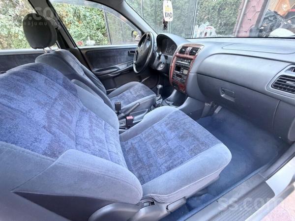 Grey Mazda 626 1998 in Riga, with an engine capacity of 2.00 L and mileage of 228 thousand km for 1199 €, photo 7 on AUTOMOTO.COM.LV