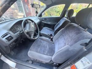 Grey Mazda 626 1998 in Riga, with an engine capacity of 2.00 L and mileage of 228 thousand km for 1199 €, photo 10 on AUTOMOTO.COM.LV