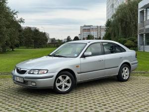 Grey Mazda 626 1999 in Riga, with an engine capacity of 2.00 L and mileage of 123 thousand km for 1090 €, photo  on AUTOMOTO.COM.LV