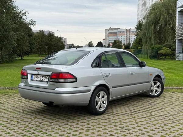 Grey Mazda 626 1999 in Riga, with an engine capacity of 2.00 L and mileage of 123 thousand km for 1090 €, photo 5 on AUTOMOTO.COM.LV
