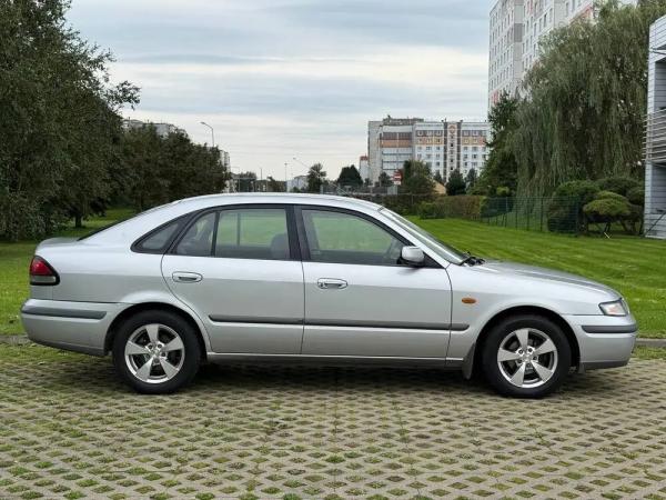 Grey Mazda 626 1999 in Riga, with an engine capacity of 2.00 L and mileage of 123 thousand km for 1090 €, photo 6 on AUTOMOTO.COM.LV