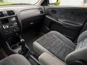 Pelēks Mazda 626 1999 Rīga, ar dzinēja tilpumu 2.00 L un nobraukumu 123 tūkst. km par 1090 €, foto 13 vietnē AUTOMOTO.COM.LV