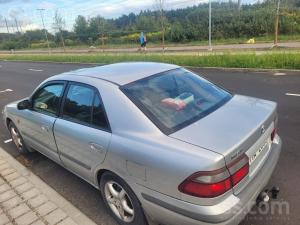 Grey Mazda 626 1999 in Riga, with an engine capacity of 2.00 L and mileage of 198 thousand km for 450 €, photo 9 on AUTOMOTO.COM.LV