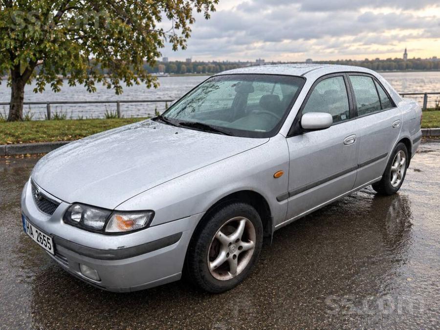 Grey Mazda 626 1999 in Riga, with an engine capacity of 2.00 L and mileage of 143 thousand km for 450 €, photo 1 on AUTOMOTO.COM.LV