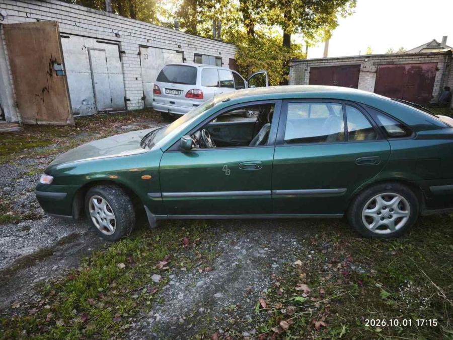 Mazda 626 1997 in Kaunas, with an engine capacity of 2.00 L and mileage of 226 thousand km for 750 €, photo 4 on AUTOMOTO.COM.LV