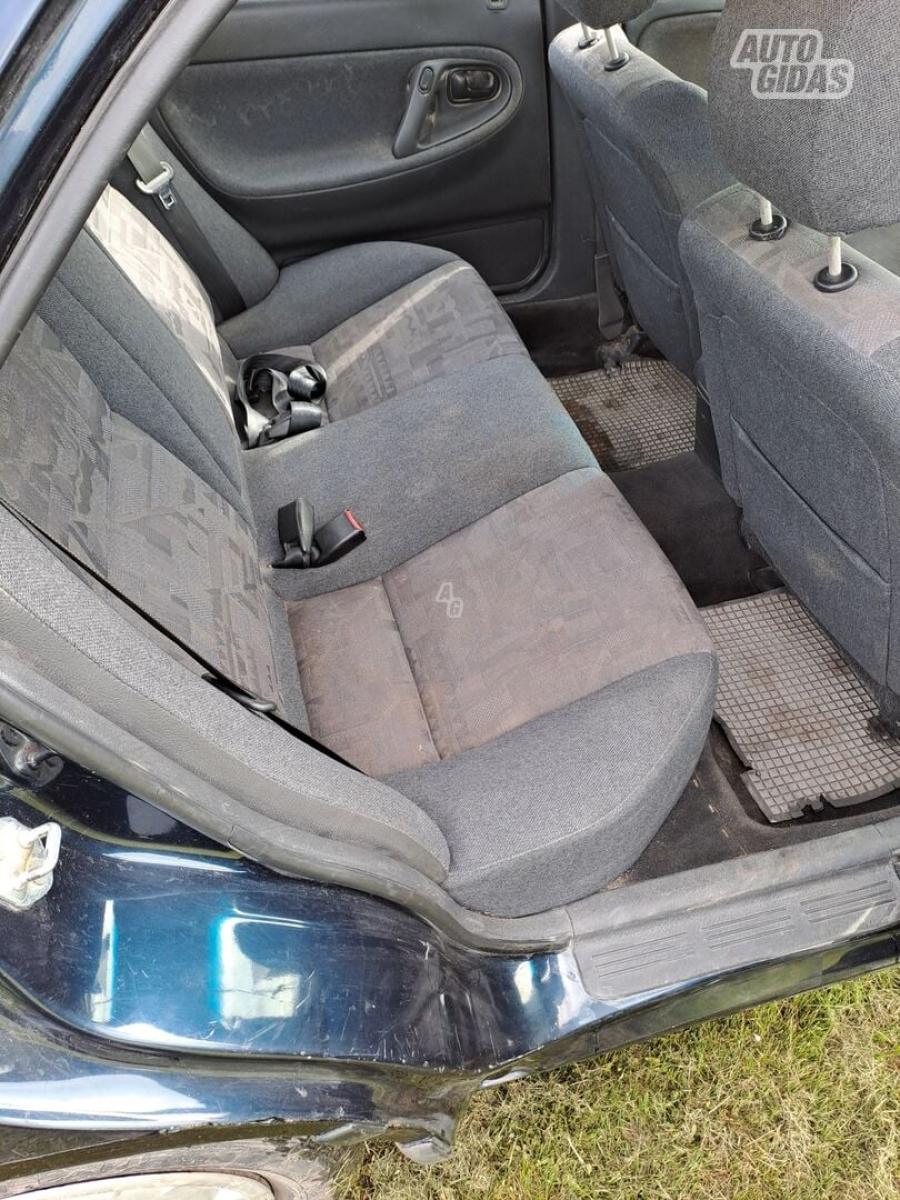 Mazda 626 1996 in Vilnius, with an engine capacity of 1.80 L and mileage of 167 thousand km for 850 €, photo 5 on AUTOMOTO.COM.LV
