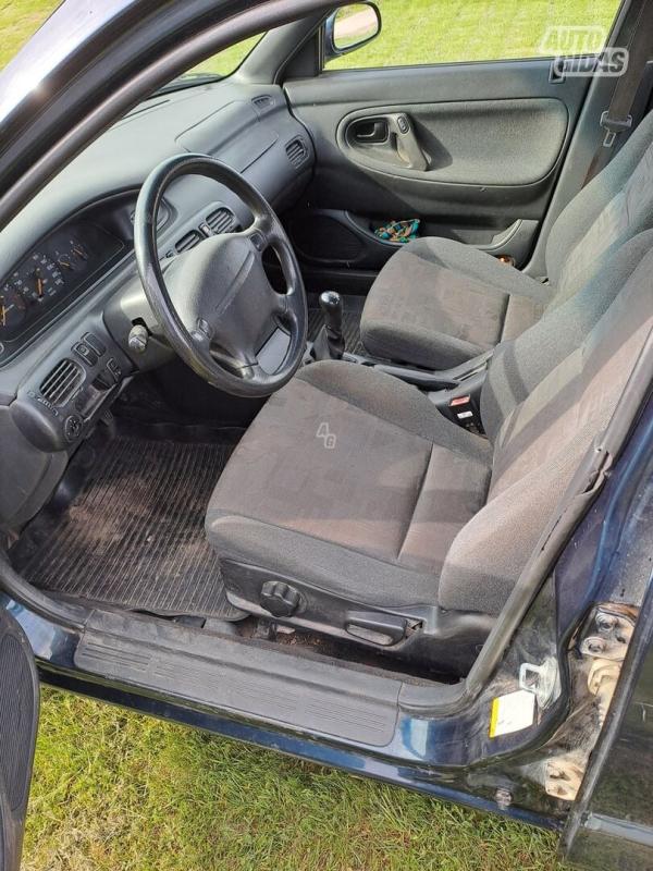 Mazda 626 1996 in Vilnius, with an engine capacity of 1.80 L and mileage of 167 thousand km for 850 €, photo 8 on AUTOMOTO.COM.LV