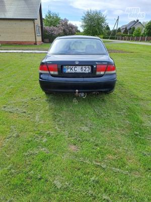 Mazda 626 1996 in Vilnius, with an engine capacity of 1.80 L and mileage of 167 thousand km for 850 €, photo 16 on AUTOMOTO.COM.LV