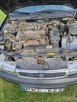 Mazda 626 1996 in Vilnius, with an engine capacity of 1.80 L and mileage of 167 thousand km for 850 €, photo 19 on AUTOMOTO.COM.LV