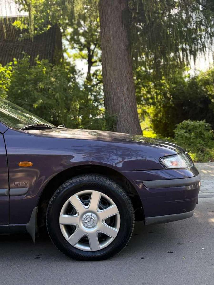 Violets Mazda 626 1998 Viļņa, ar dzinēja tilpumu 1.80 L un nobraukumu 269 tūkst. km par 1150 €, foto 5 vietnē AUTOMOTO.COM.LV