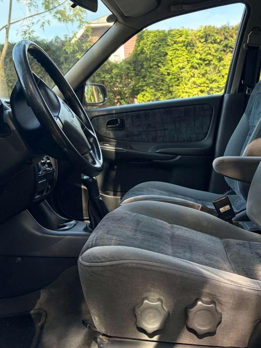 Violets Mazda 626 1998 Viļņa, ar dzinēja tilpumu 1.80 L un nobraukumu 269 tūkst. km par 1150 €, foto 14 vietnē AUTOMOTO.COM.LV
