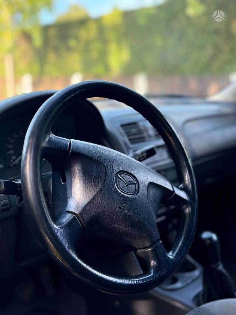 Violets Mazda 626 1998 Viļņa, ar dzinēja tilpumu 1.80 L un nobraukumu 269 tūkst. km par 1150 €, foto 24 vietnē AUTOMOTO.COM.LV