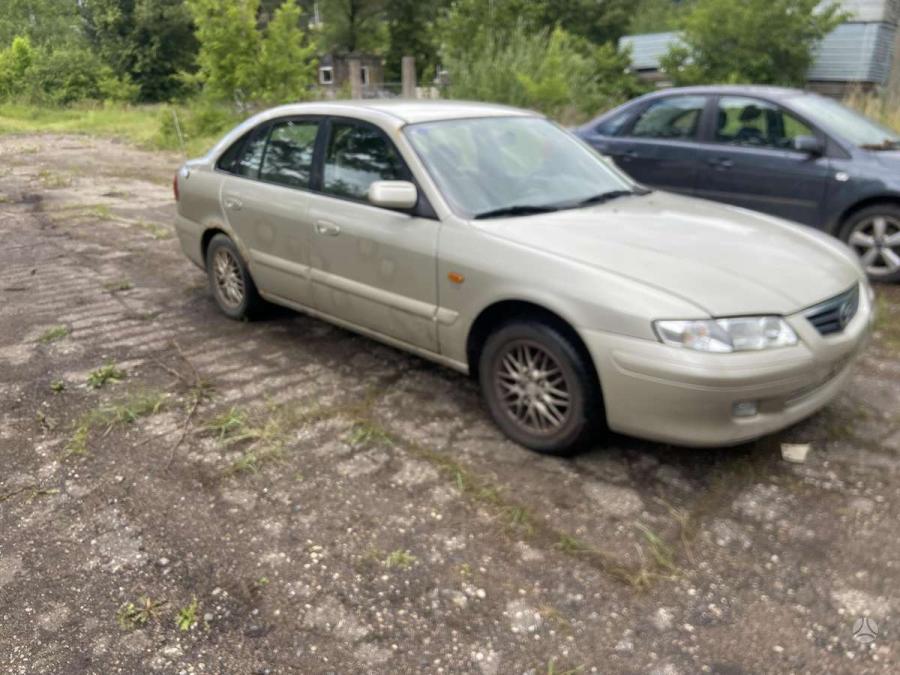Yellow Mazda 626 2000 in Kaunas, with an engine capacity of 1.84 L and mileage of 220 thousand km for 999 €, photo 3 on AUTOMOTO.COM.LV