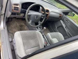 Yellow Mazda 626 2000 in Kaunas, with an engine capacity of 1.84 L and mileage of 220 thousand km for 999 €, photo 5 on AUTOMOTO.COM.LV