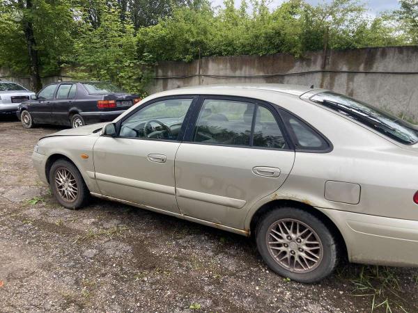 Dzeltens Mazda 626 2000 Kauņa, ar dzinēja tilpumu 1.84 L un nobraukumu 220 tūkst. km par 999 €, foto 5 vietnē AUTOMOTO.COM.LV