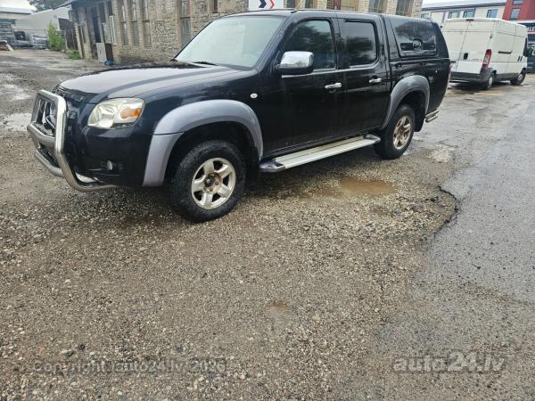 Black Mazda BT-50 2008 in Tallinn, with an engine capacity of 2.50 L and mileage of 280 thousand km for 4999 €, photo 2 on AUTOMOTO.COM.LV