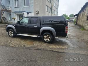 Black Mazda BT-50 2008 in Tallinn, with an engine capacity of 2.50 L and mileage of 280 thousand km for 4999 €, photo 4 on AUTOMOTO.COM.LV