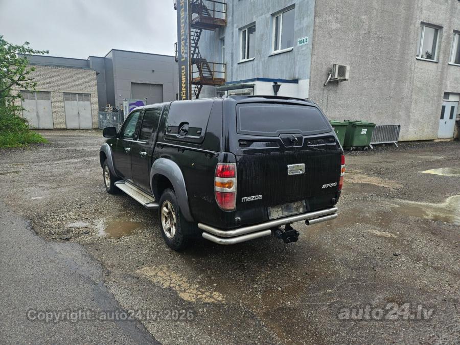 Black Mazda BT-50 2008 in Tallinn, with an engine capacity of 2.50 L and mileage of 280 thousand km for 4999 €, photo 7 on AUTOMOTO.COM.LV