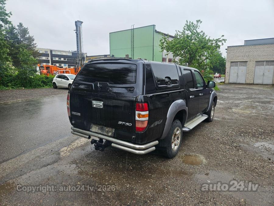 Black Mazda BT-50 2008 in Tallinn, with an engine capacity of 2.50 L and mileage of 280 thousand km for 4999 €, photo 8 on AUTOMOTO.COM.LV