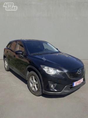 Black Mazda CX-3 2014 in Vilnius, with an engine capacity of 2.20 L and mileage of 178 thousand km for 3950 €, photo 1 on AUTOMOTO.COM.LV