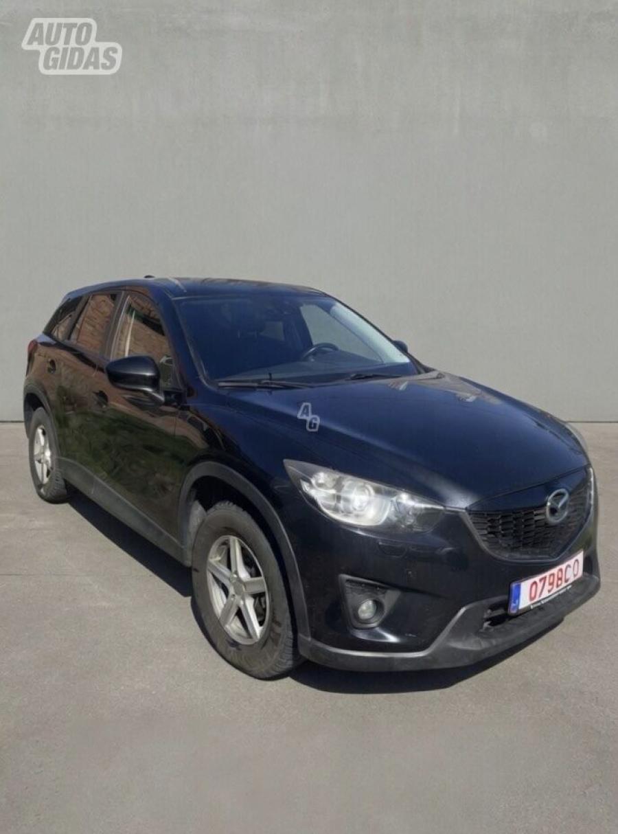 Black Mazda CX-3 2014 in Vilnius, with an engine capacity of 2.20 L and mileage of 178 thousand km for 3950 €, photo 1 on AUTOMOTO.COM.LV
