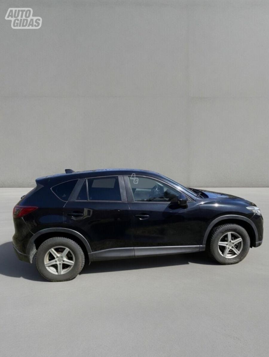Black Mazda CX-3 2014 in Vilnius, with an engine capacity of 2.20 L and mileage of 178 thousand km for 3950 €, photo 3 on AUTOMOTO.COM.LV