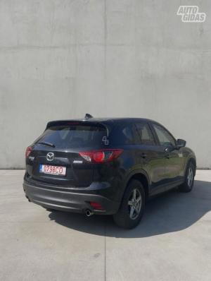 Black Mazda CX-3 2014 in Vilnius, with an engine capacity of 2.20 L and mileage of 178 thousand km for 3950 €, photo 4 on AUTOMOTO.COM.LV