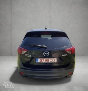 Black Mazda CX-3 2014 in Vilnius, with an engine capacity of 2.20 L and mileage of 178 thousand km for 3950 €, photo 5 on AUTOMOTO.COM.LV